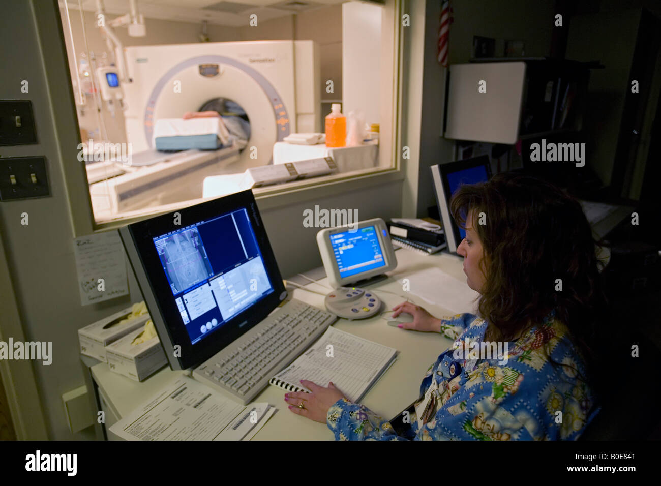 Patient gets CT scan during clinical trial of new cancer treatment ...