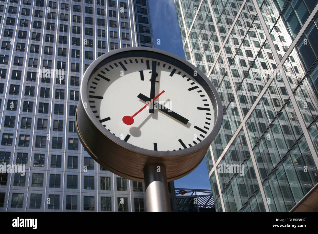 Clockface and skyscapers Stock Photo - Alamy