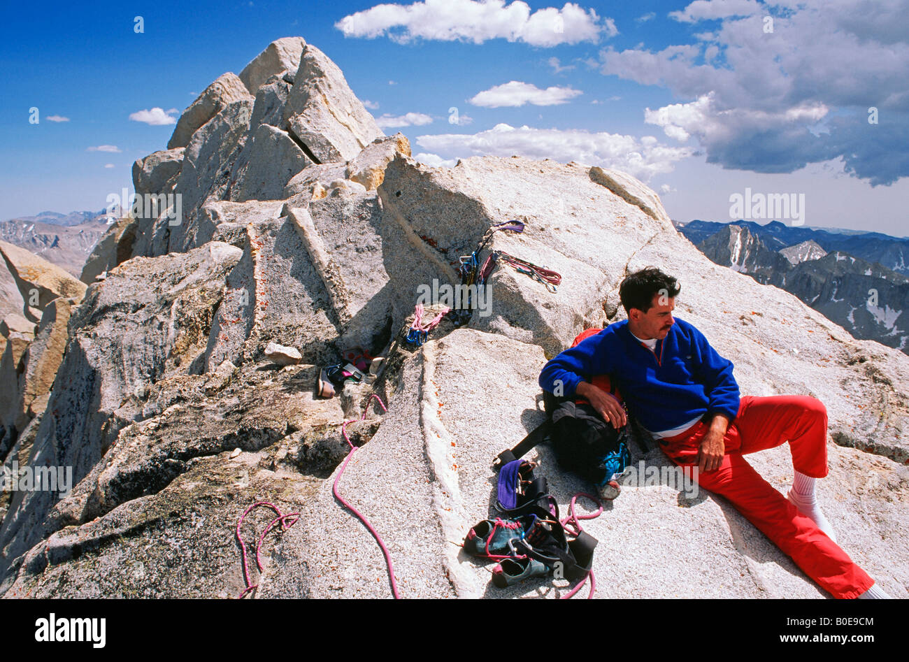 Climber looking out from the summit of Bear Creek Spire John Muir ...