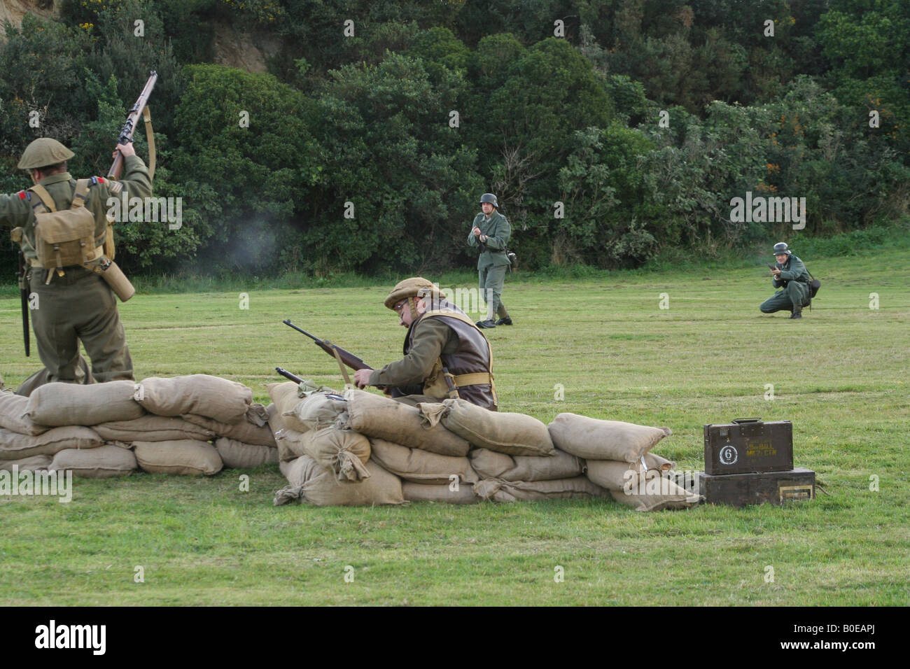 Soldier gets shot in a WW-II battle scene re-enactment Stock Photo - Alamy