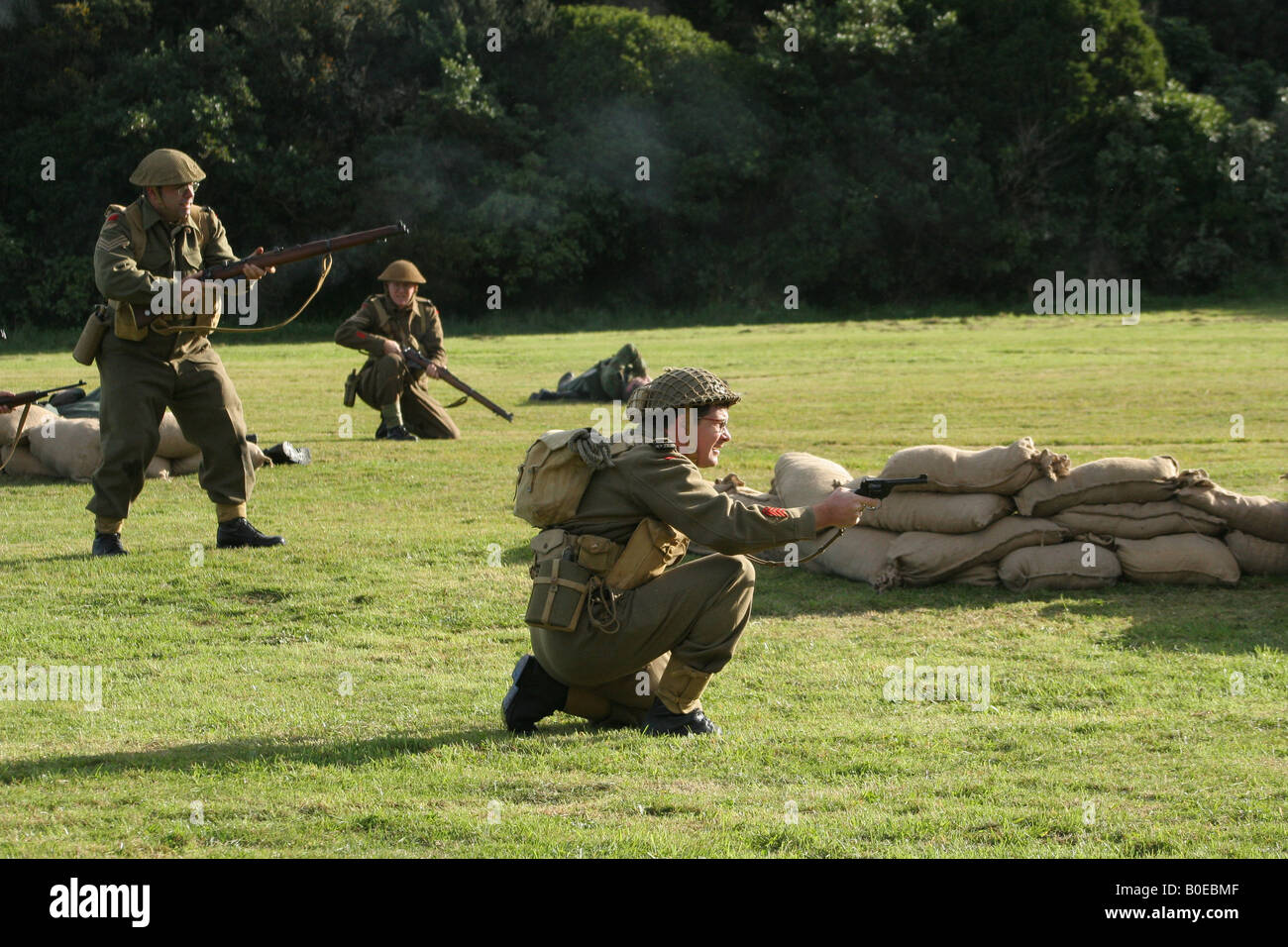 Soldiers advancing in a WW-II battle scene re-enactment Stock Photo - Alamy