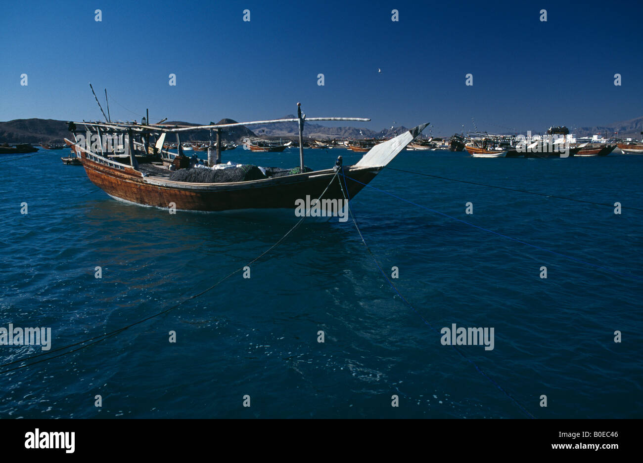 Dhow boat ship sur port harbour oman hi-res stock photography and ...