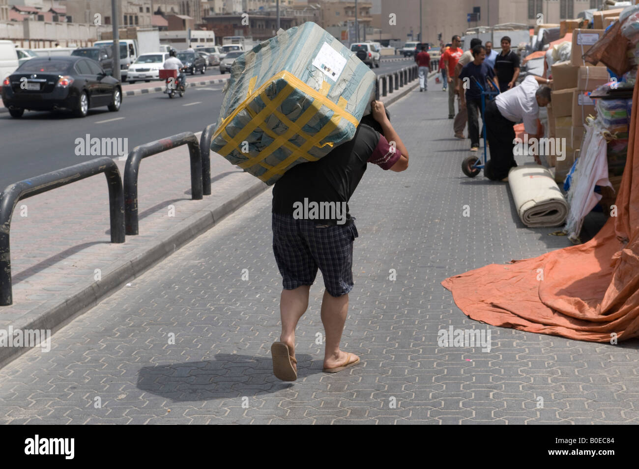 Old man carrying heavy load hi-res stock photography and images - Alamy