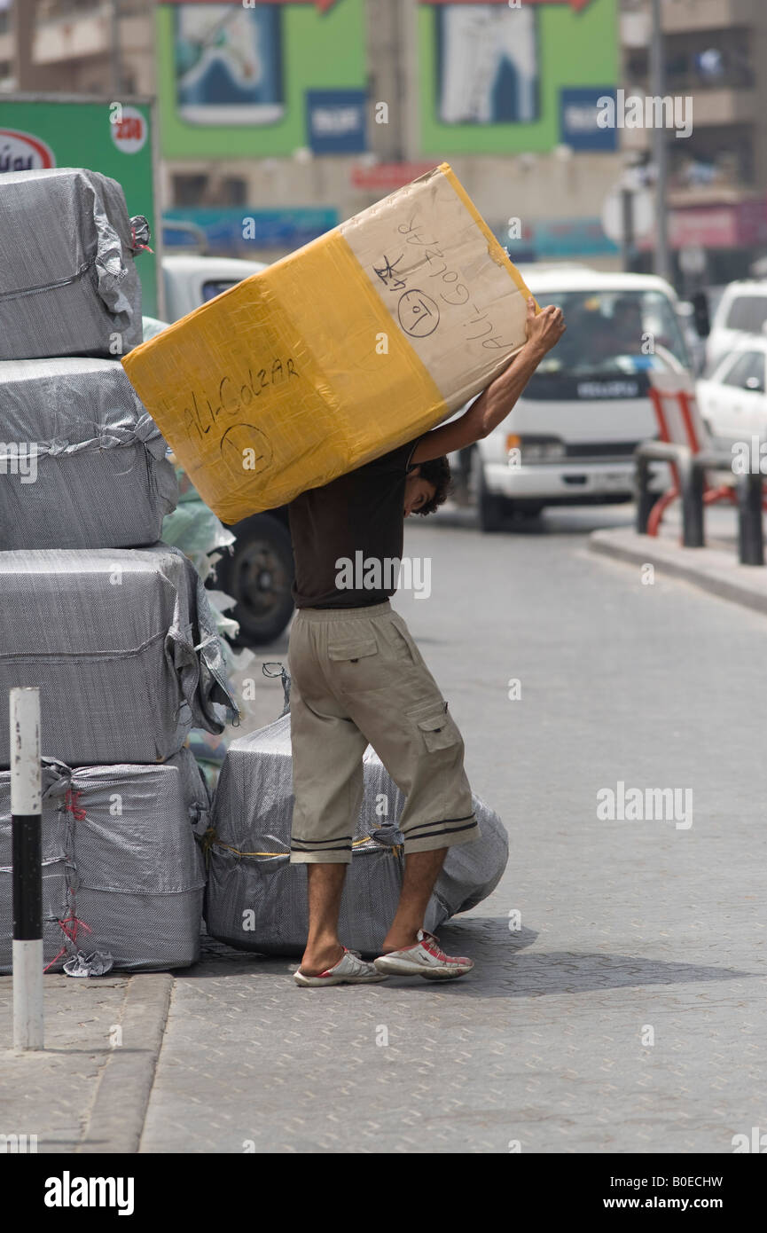 Old man carrying heavy load hi-res stock photography and images - Alamy