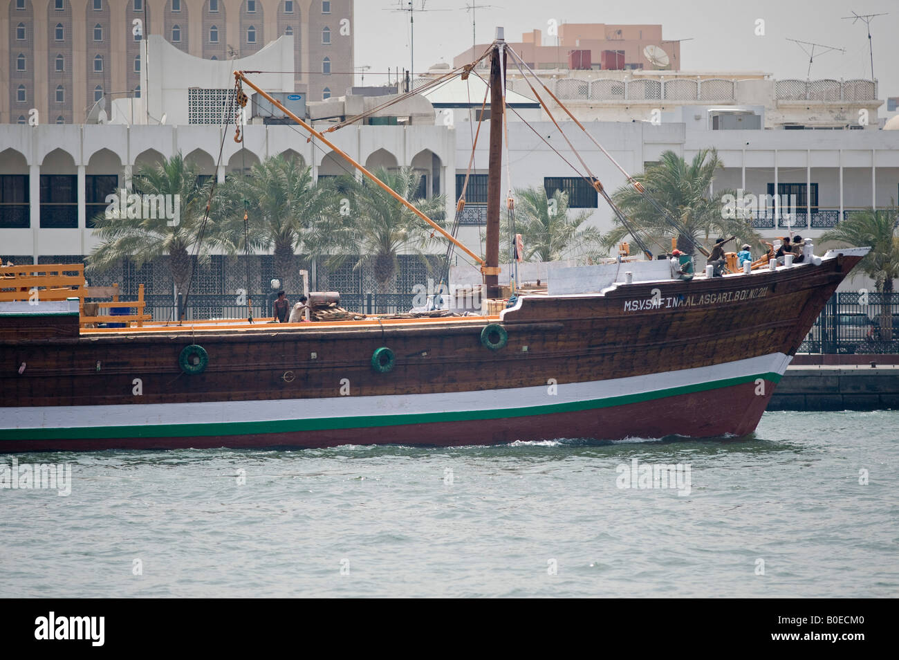Dubai, United Arab Emirates (UAE). A dhow sails past modern office ...