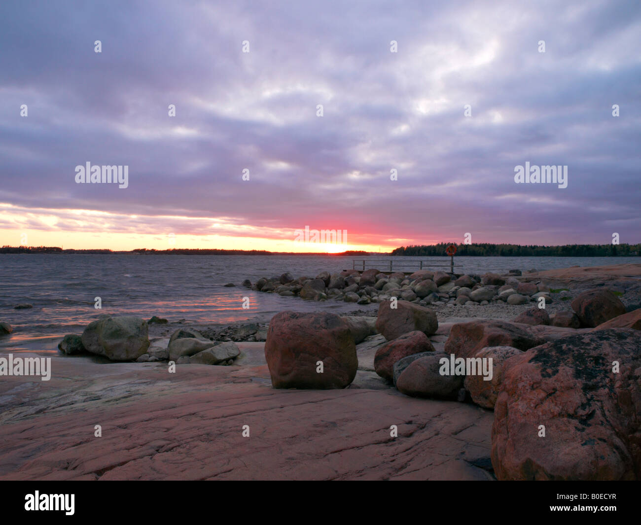 Sunset at The Coast of Finland Stock Photo - Alamy