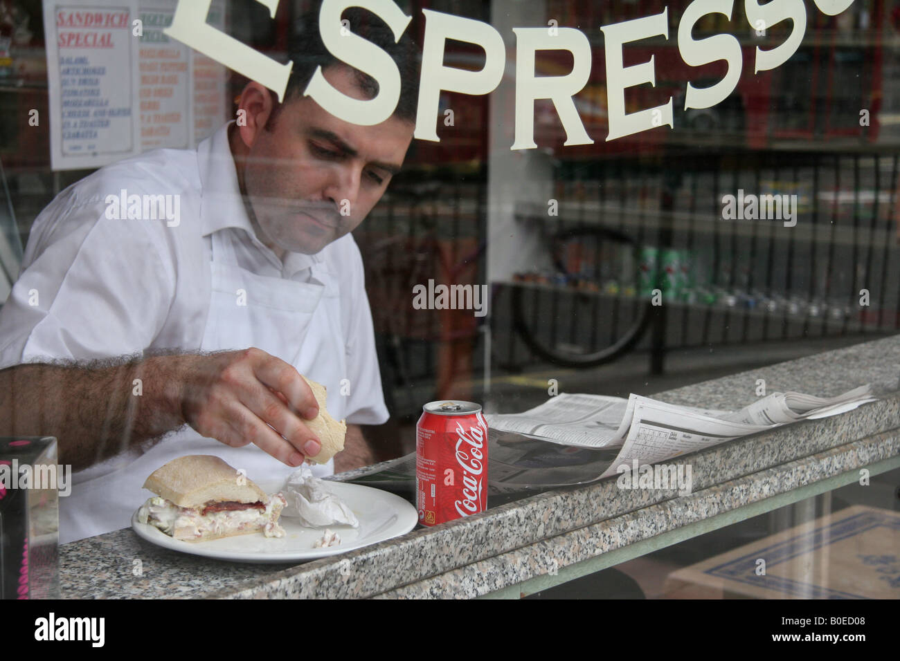 man eating lunch in espresso bar Stock Photo - Alamy