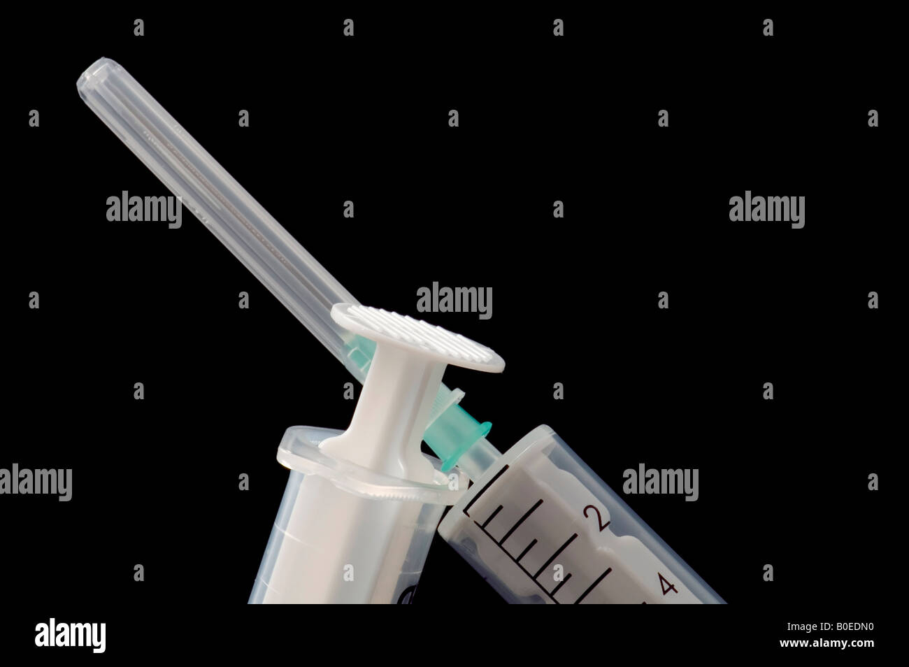 object on black medical tool Syringe Stock Photo - Alamy