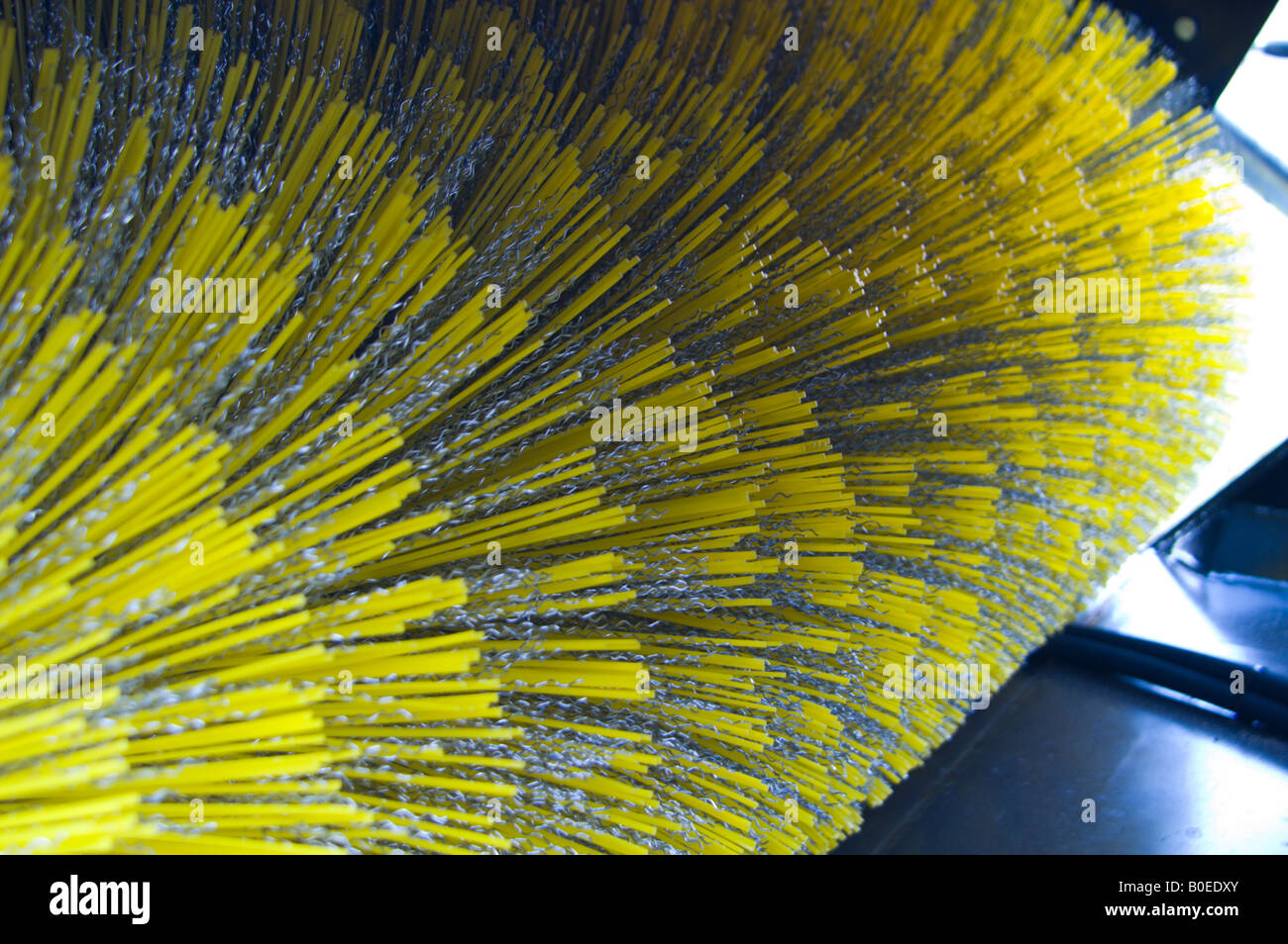 Plant machinery - brush on street sweeping machine Stock Photo - Alamy