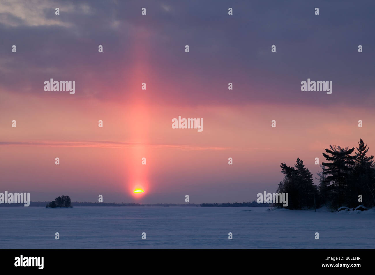 sun pillar over frozen Rainy Lake, Voyageurs National Park, Minnesota ...