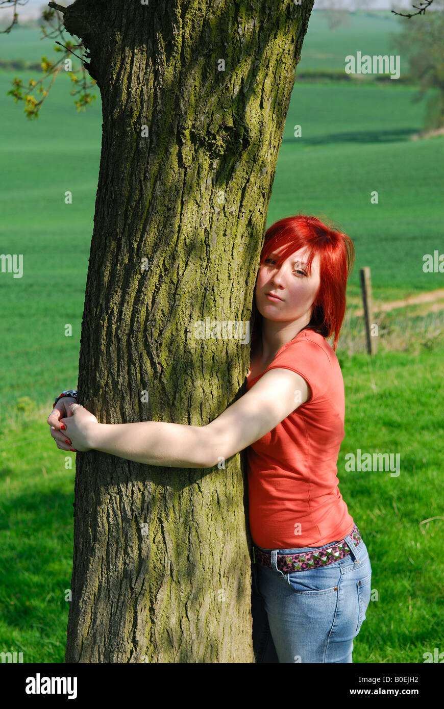 Female teenager tree hugger hi-res stock photography and images - Alamy
