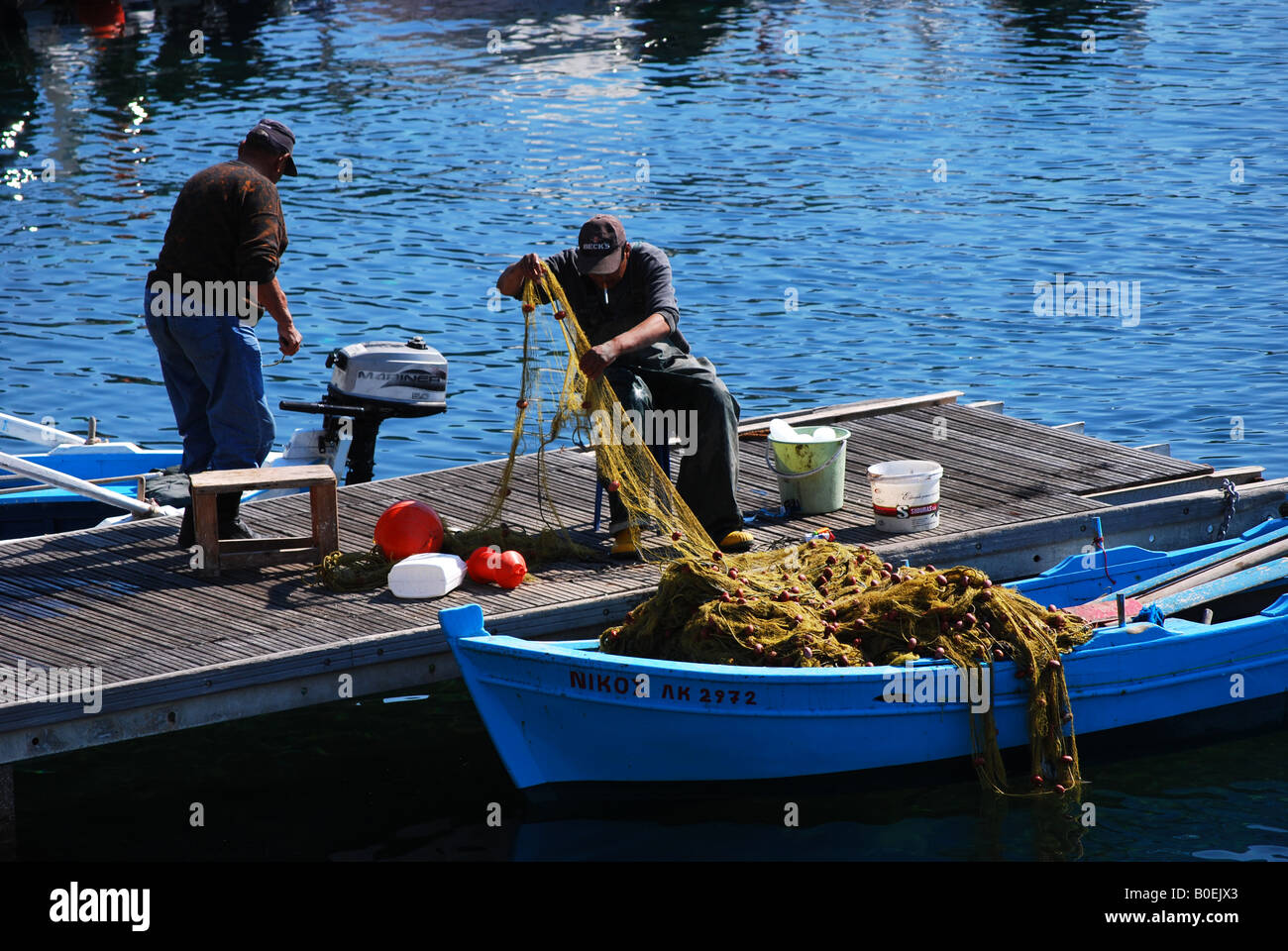 Water two fishermen hi-res stock photography and images - Alamy