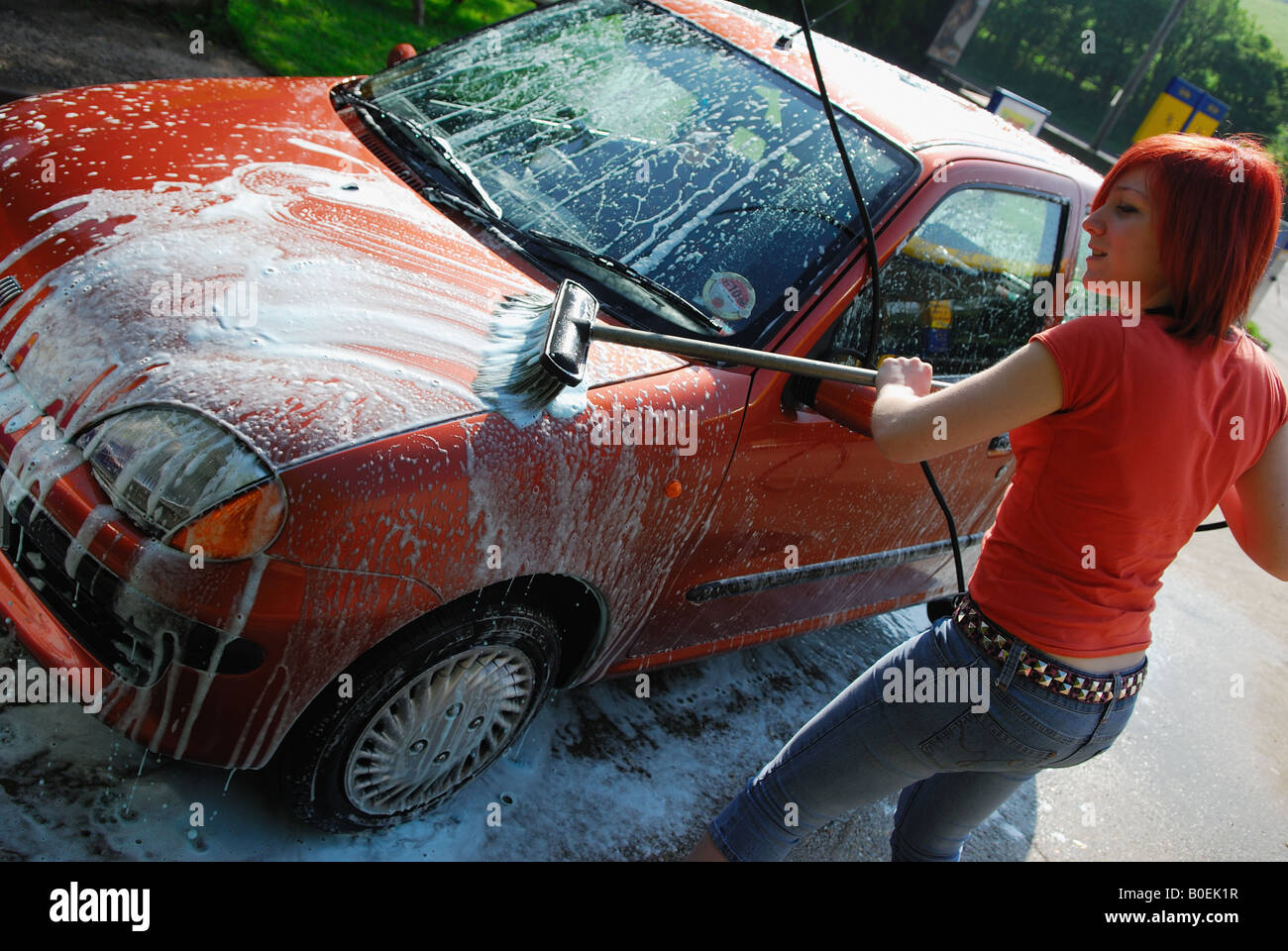 Teenager washing car hi-res stock photography and images - Alamy