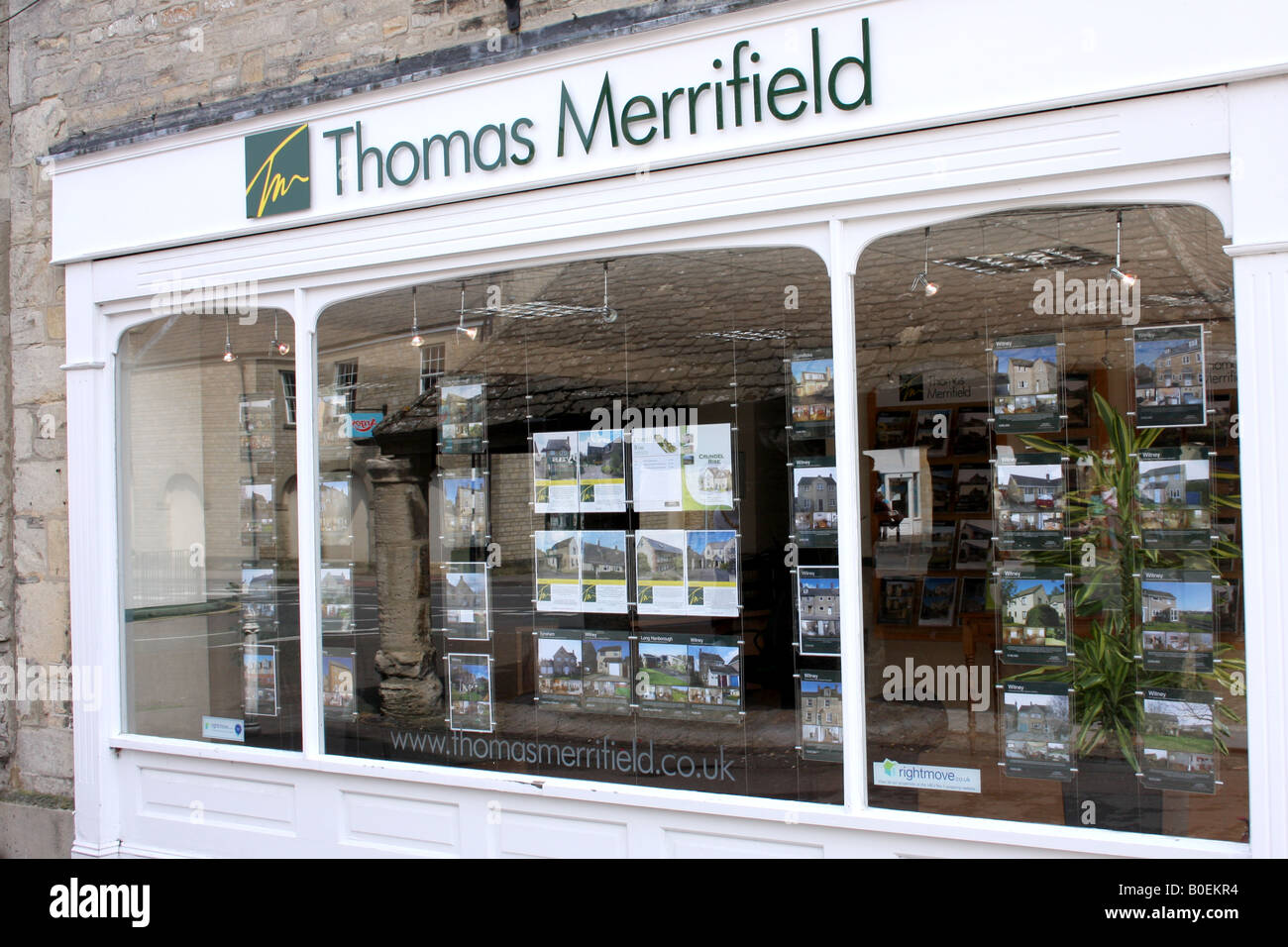 An estate agent's window in the UK Stock Photo - Alamy