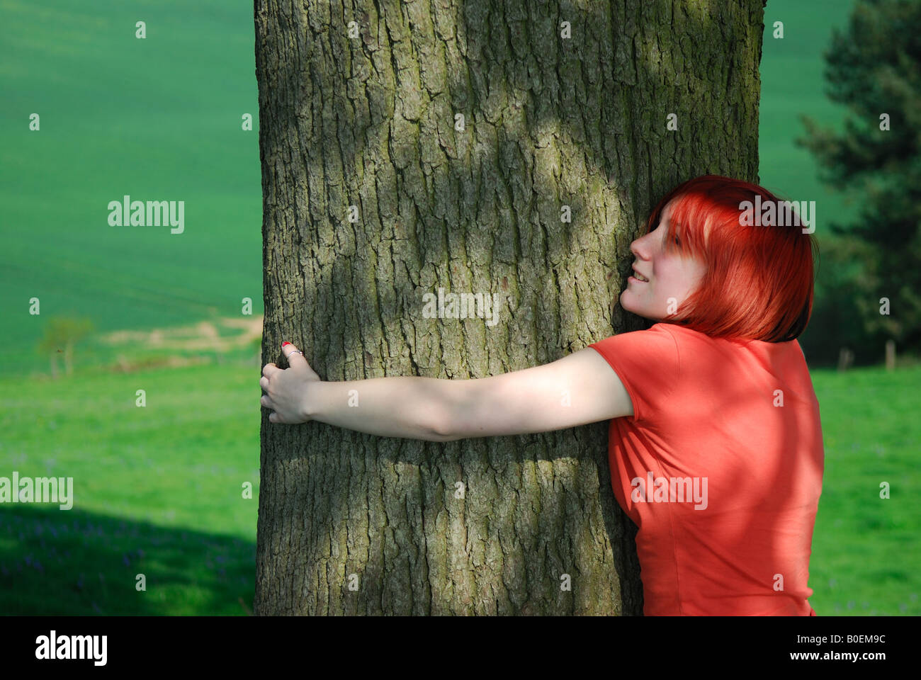 Tree Hugging Women Stock Photo - Alamy