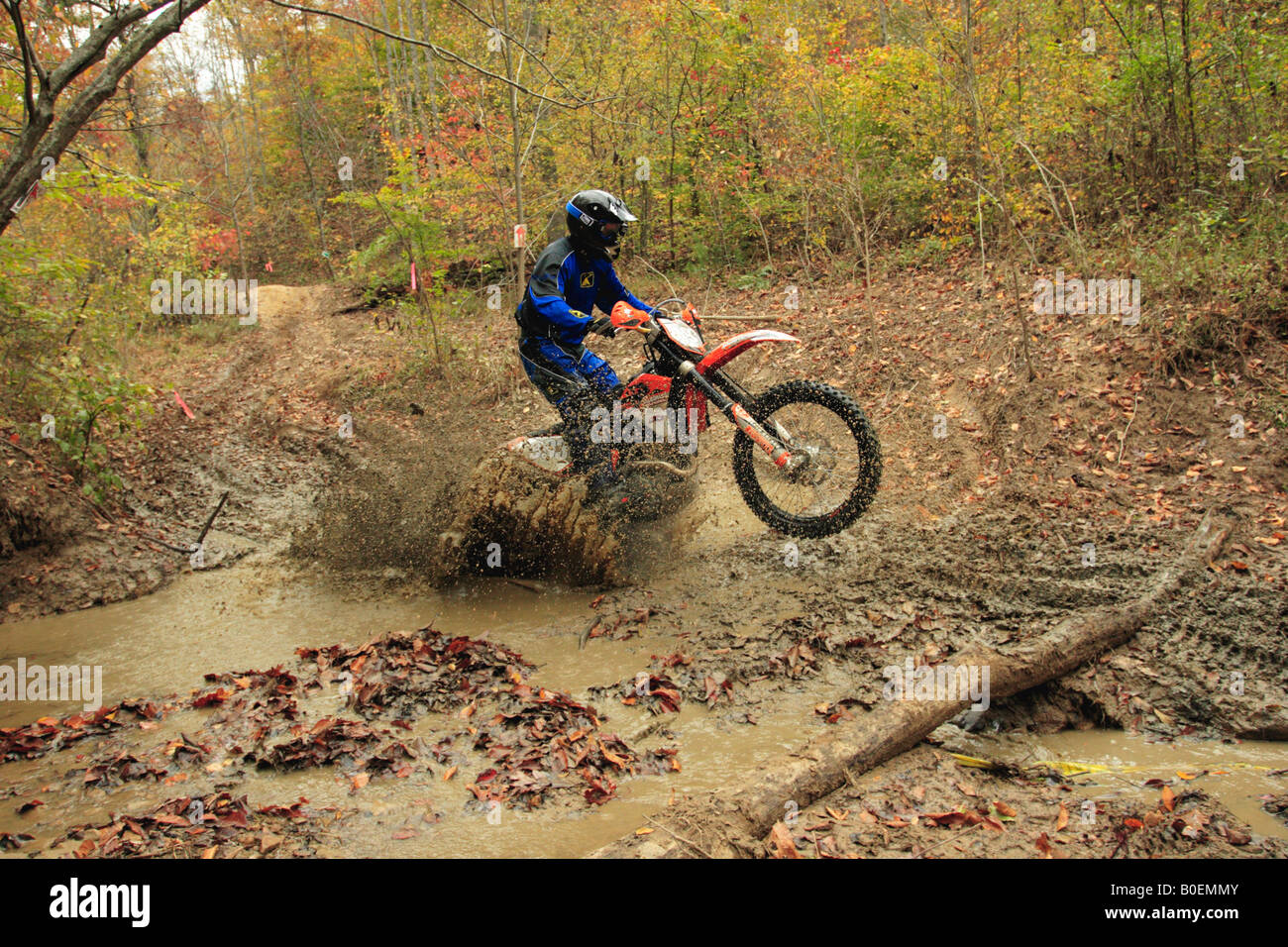 motorcycle in mud Stock Photo - Alamy