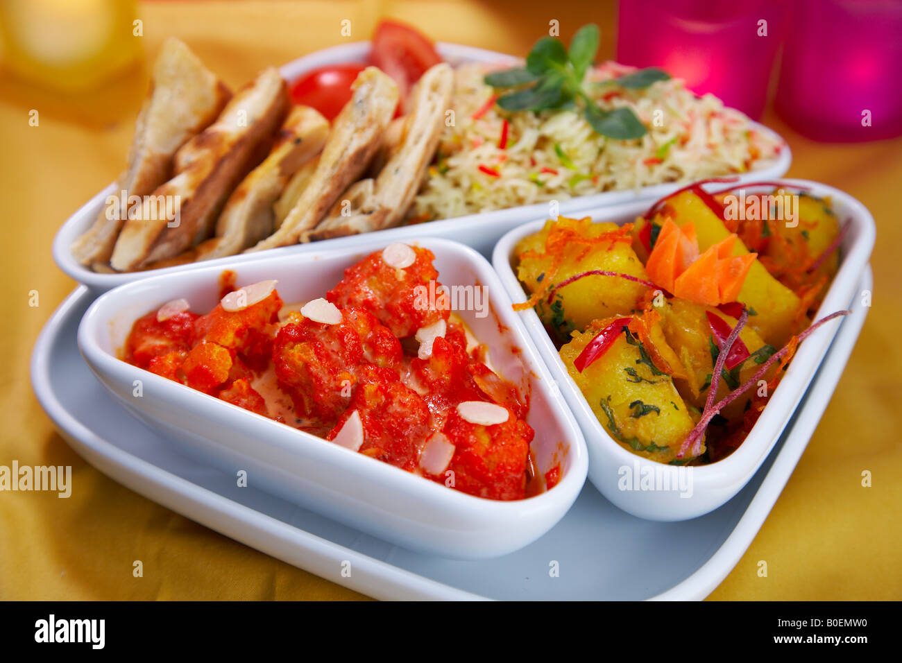 Indian set lunch meal.Chicken tikka massala and bombay aloo Stock Photo ...