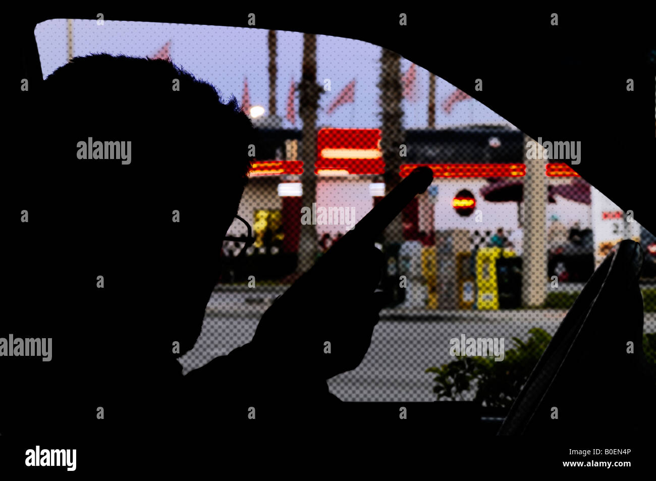 law enforcement officer with gun drawn at stakeout location textured ...