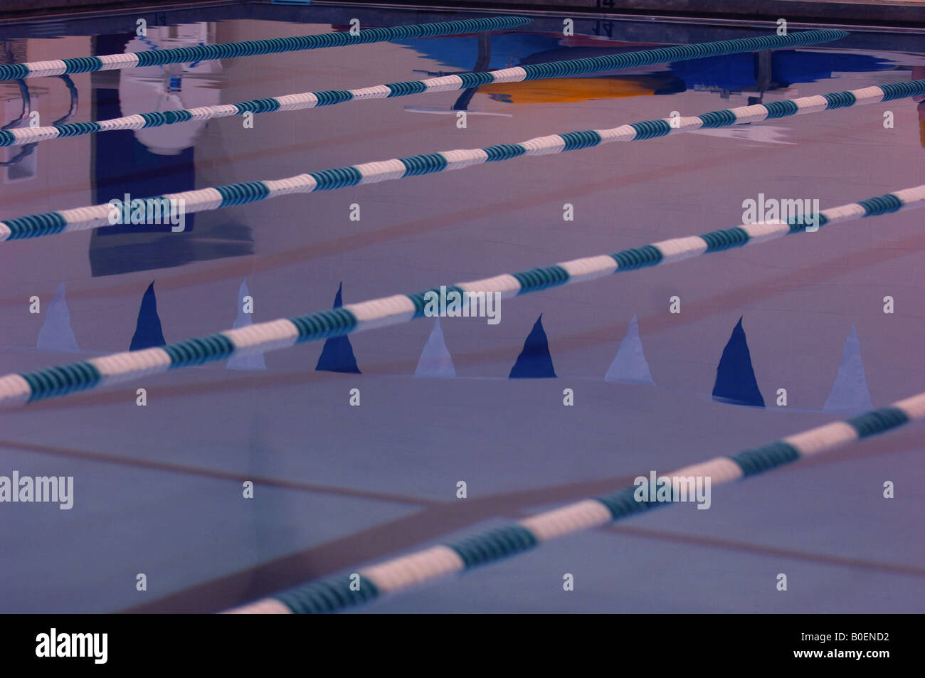 swimming pool with reflecting flags and robe lanes Stock Photo - Alamy