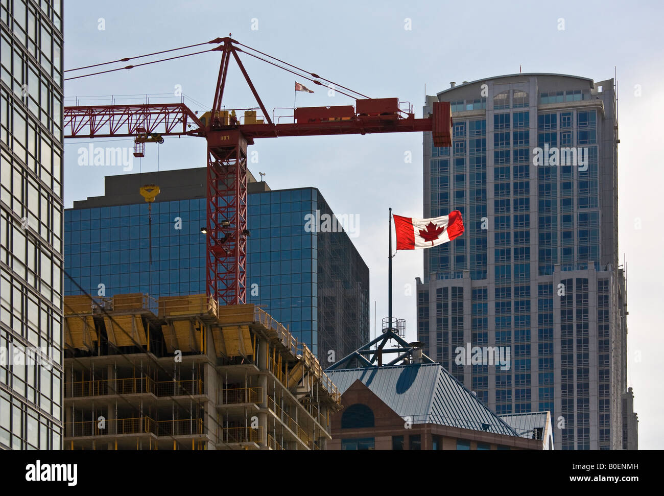 Canadian flag flying over Toronto construction site Stock Photo - Alamy