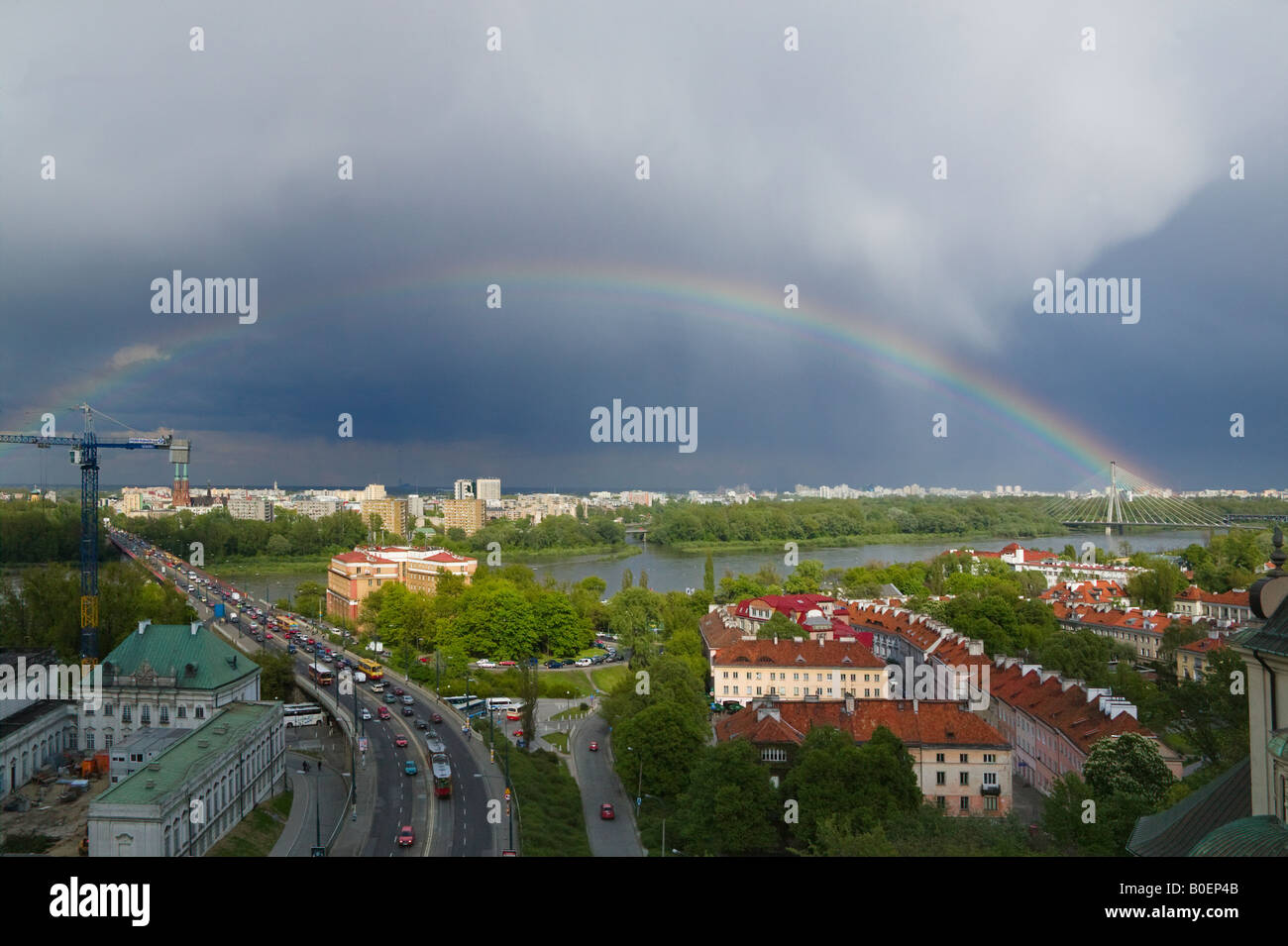 Rainbow over bridge and old town cityscape Warsaw Poland Stock Photo ...