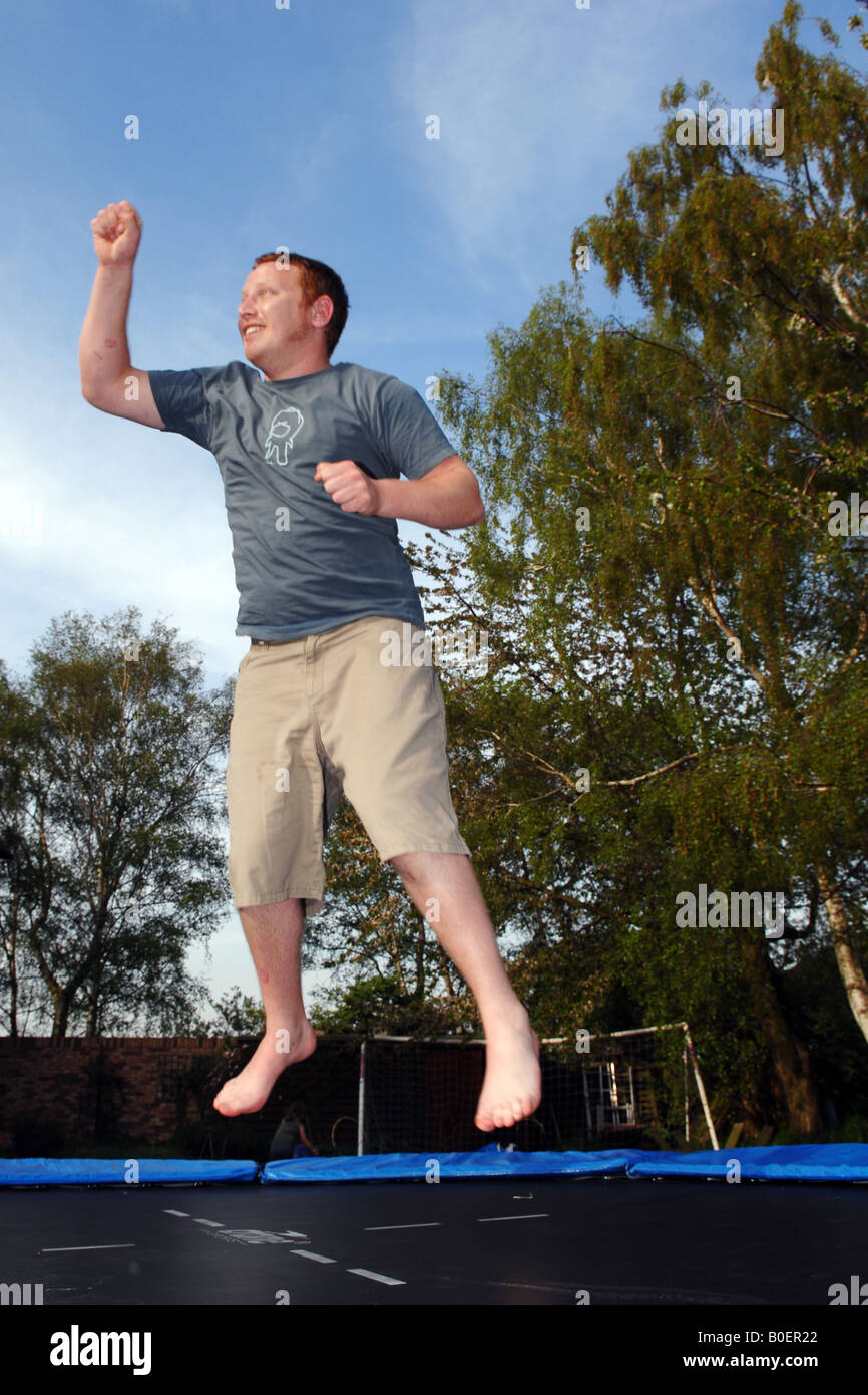 Trampoline garden man hi-res stock photography and images - Alamy