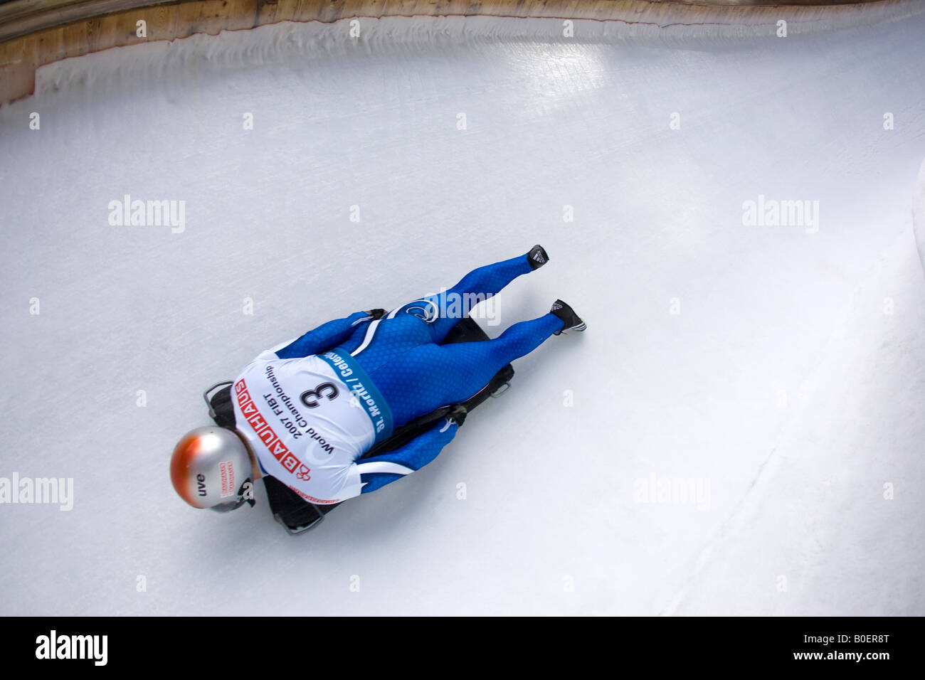 A Skeleton racer speeding down the Olympic Bob-sleigh run at St Moritz ...