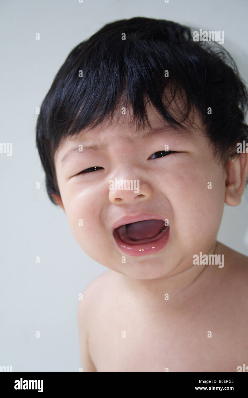 Baby boy crying Stock Photo - Alamy