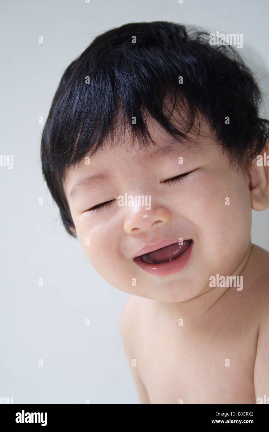 Chinese baby boy crying Stock Photo - Alamy