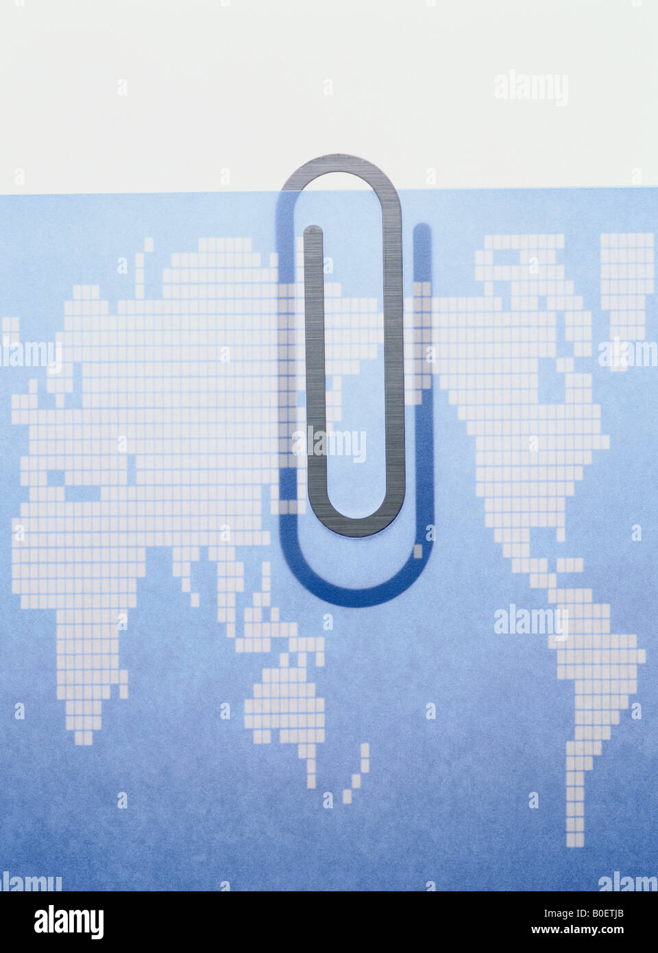 Paper Clip On World Map Stock Photo - Alamy