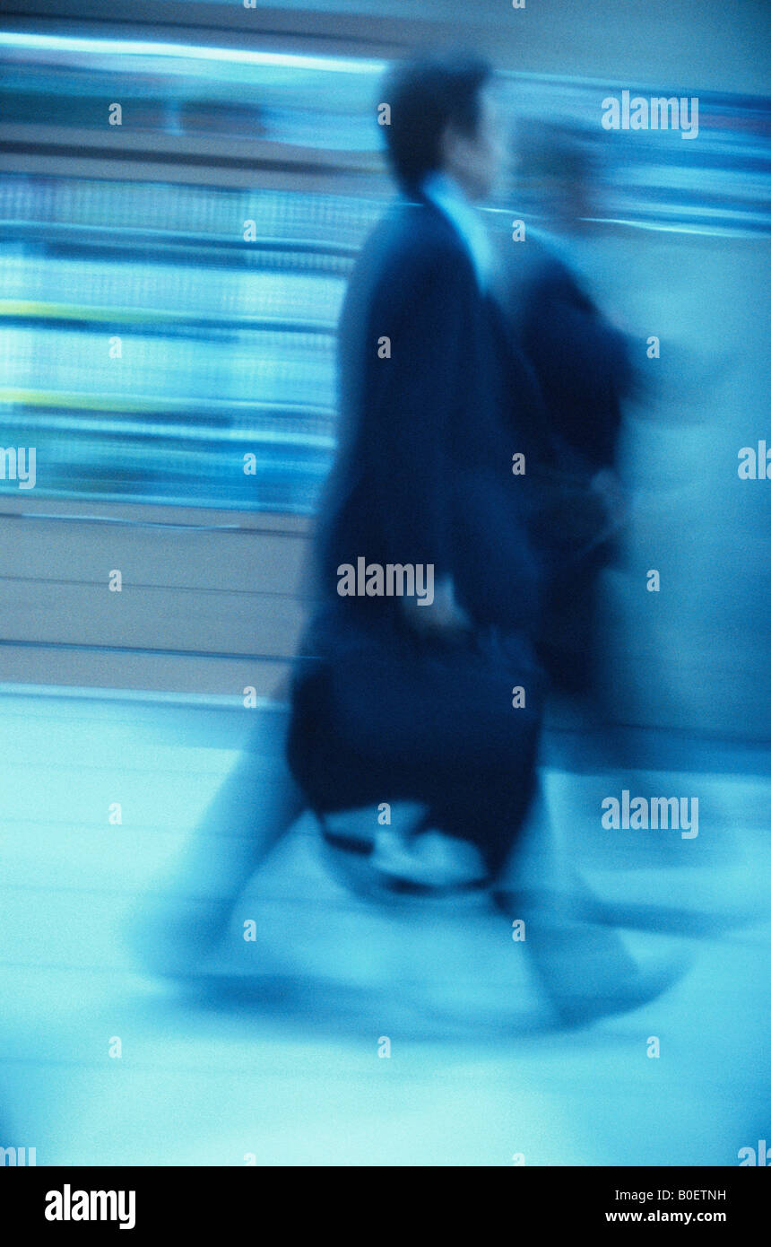 Walking commuters suits hi-res stock photography and images - Alamy