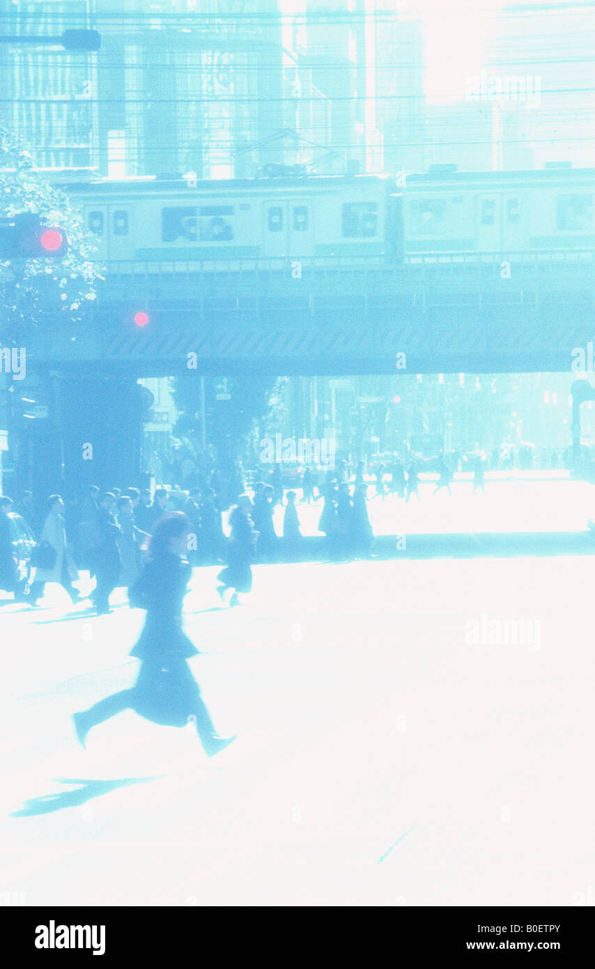 Commuter Running Across Road Stock Photo - Alamy