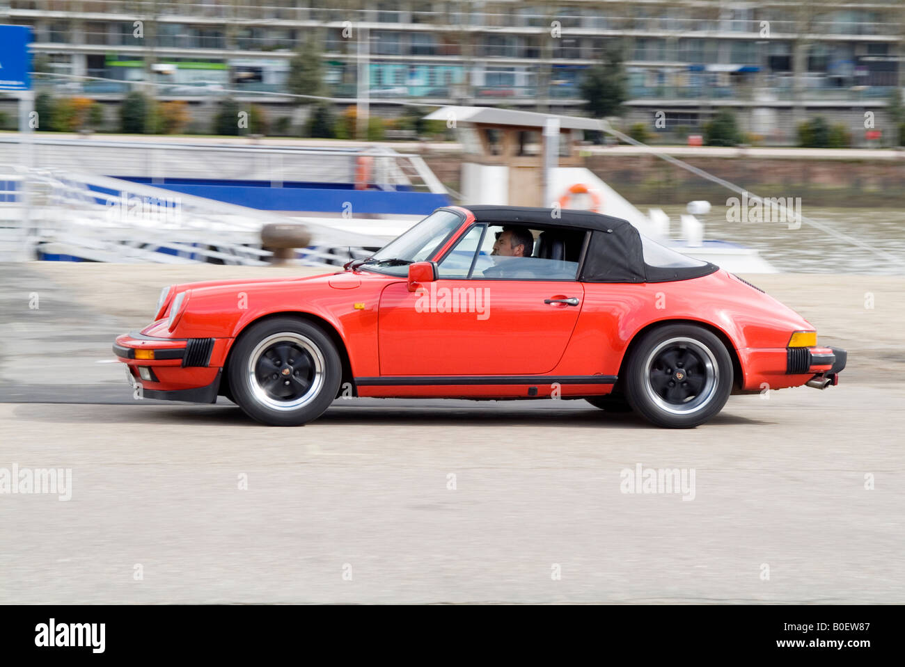 red porsche 911 sports car german high performance rear engined ...