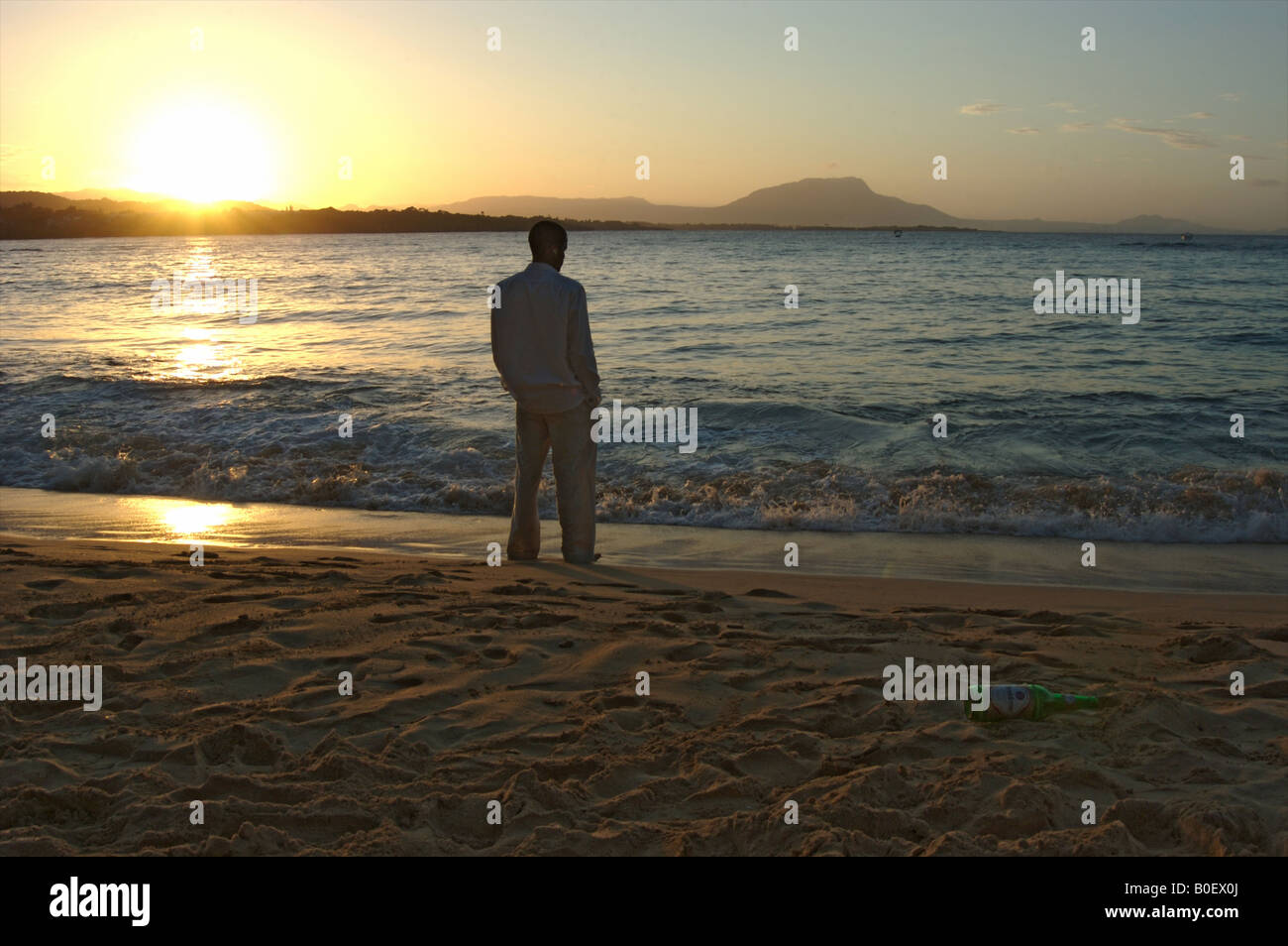 man watching the sunset Stock Photo - Alamy