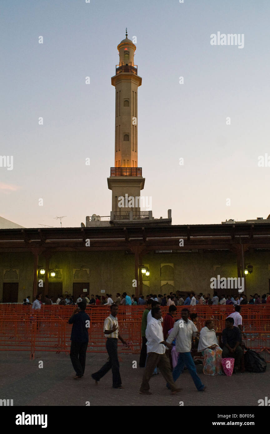 People gathering outside a mosque in Dubai Stock Photo - Alamy
