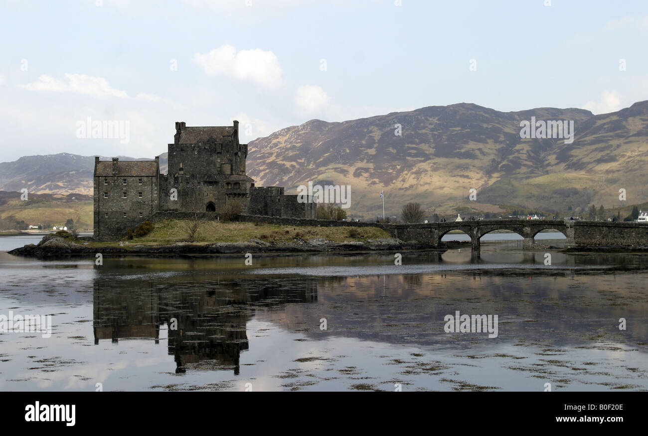 Eilean Donan castle sits on its own island on Loch Duich and is one of ...