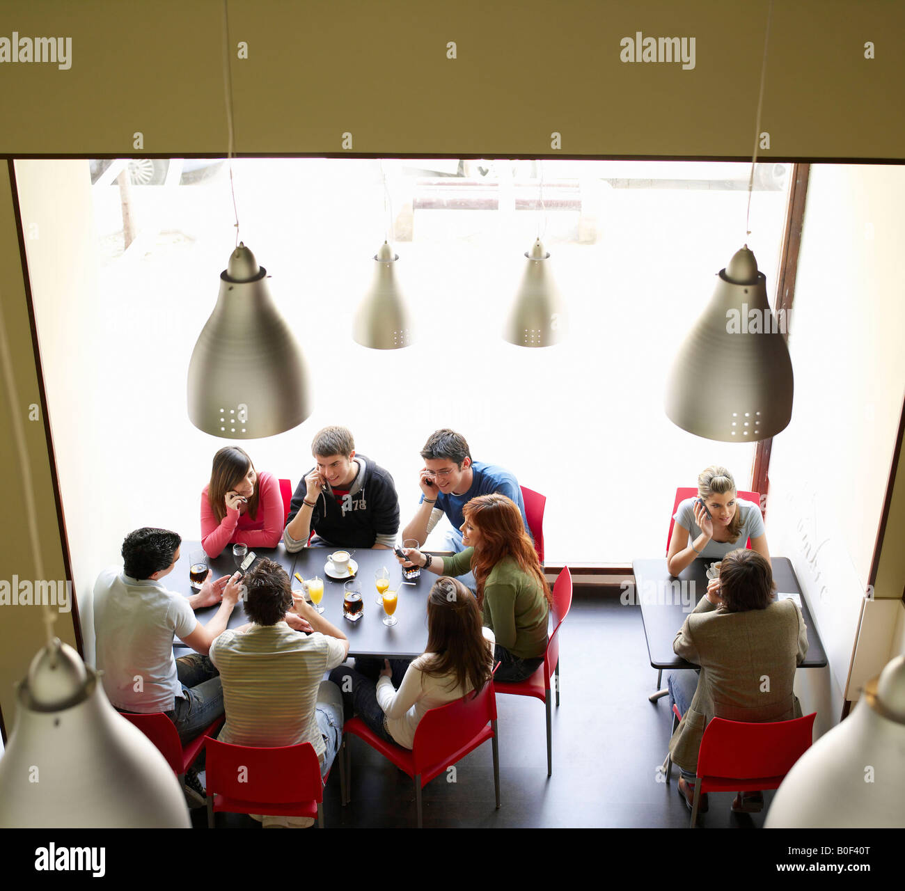 Group of teenagers in cafe Stock Photo - Alamy
