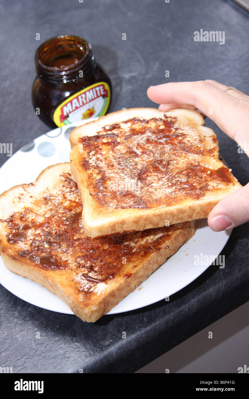 Spreading marmite hi-res stock photography and images - Alamy