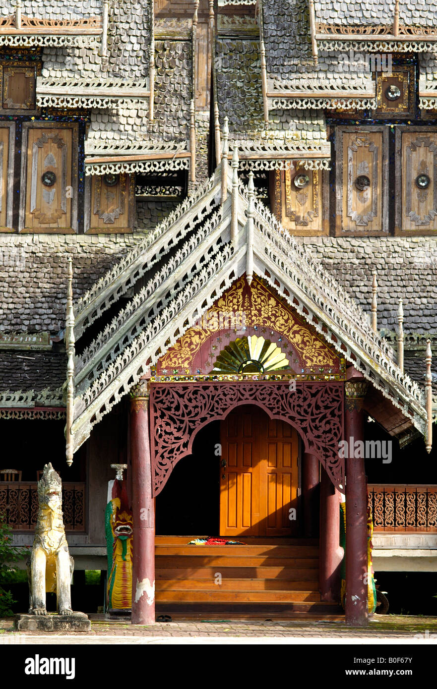 The entrance to Wat Nantarm, Chiang Kham, Northern Thailand. Gilded in ...