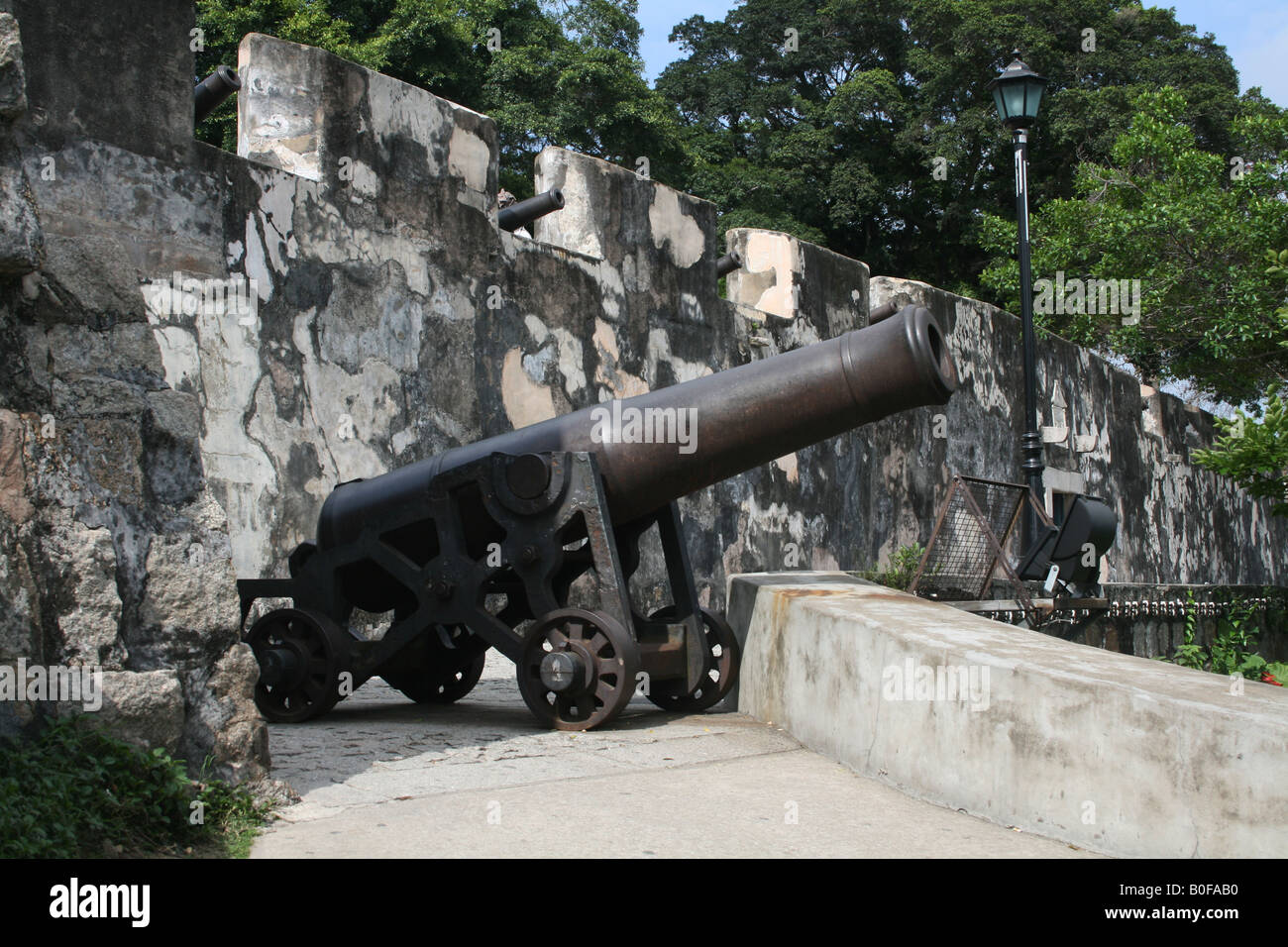 ancient cannon and walls of ruined Portuguese fort in Melaka Malaysia ...