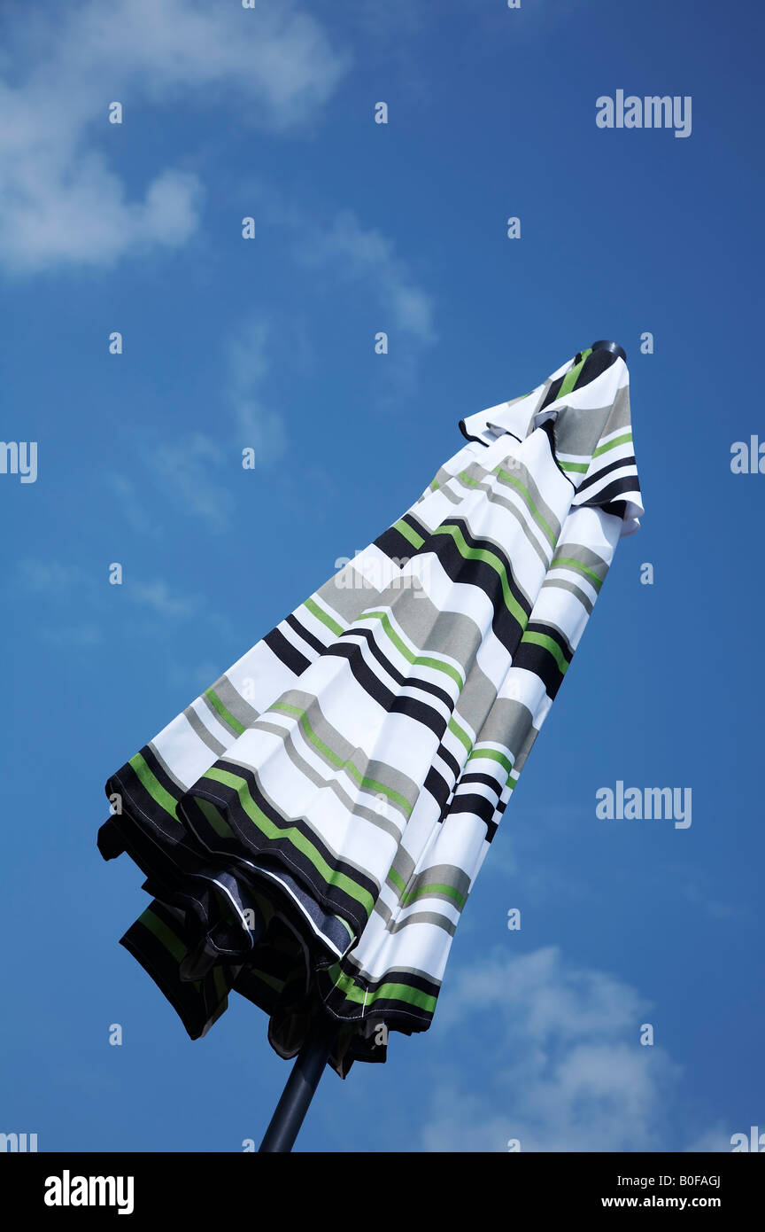 Closed parasol hi-res stock photography and images - Alamy