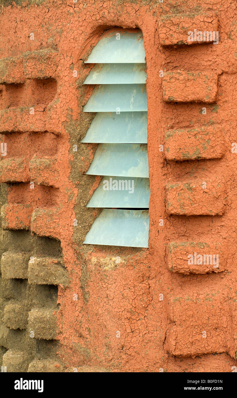 The window of a home made of natural materials in Asia - brick, rice ...