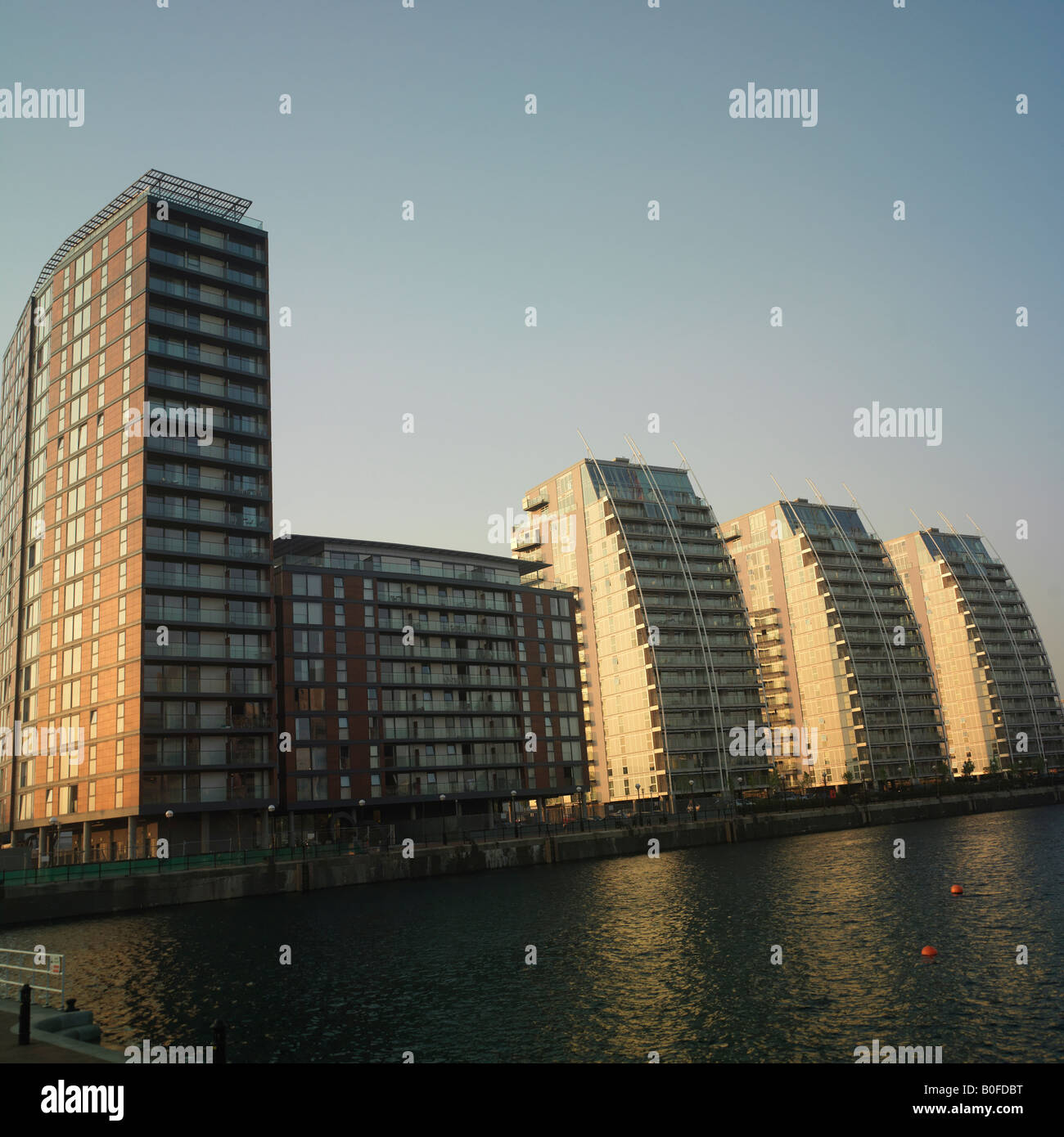 Apartments at sunset, Salford Quays Stock Photo - Alamy