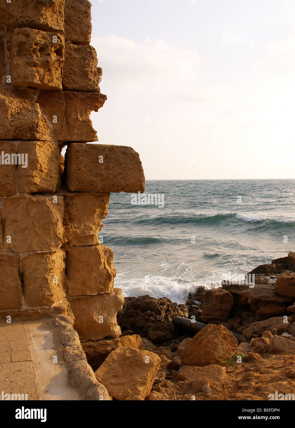 The ruins on the beach in Caesarea National Park, Israel Stock Photo ...