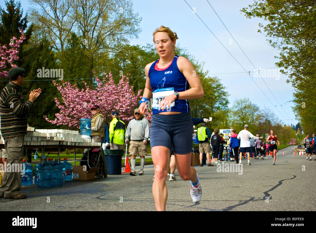 Runners passing Water Station #11 near mile 21 of the Vancouver ...