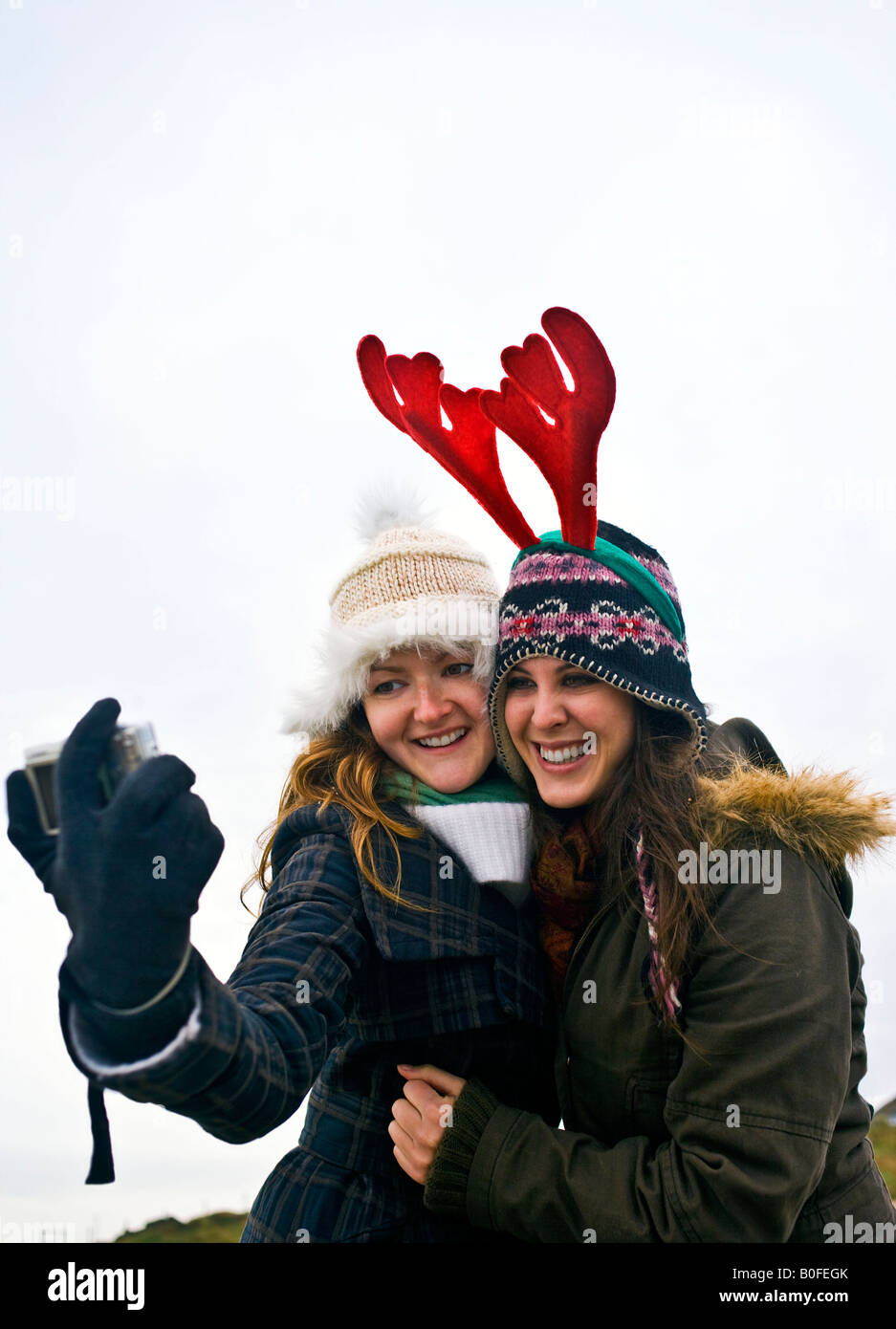 Girls taking self photo Stock Photo - Alamy