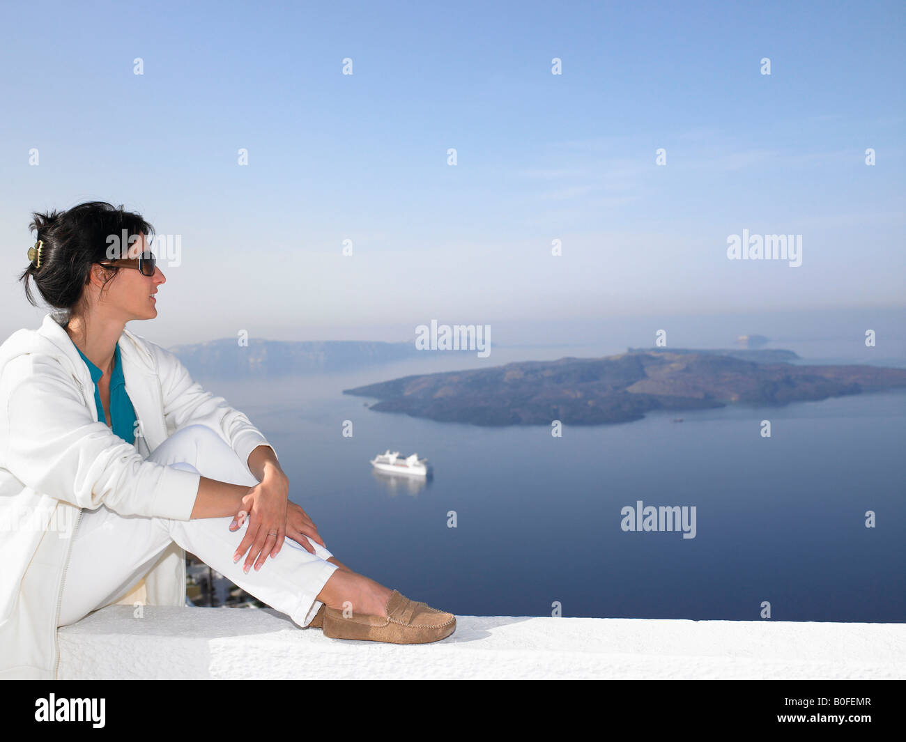 Woman contemplating a view Stock Photo - Alamy