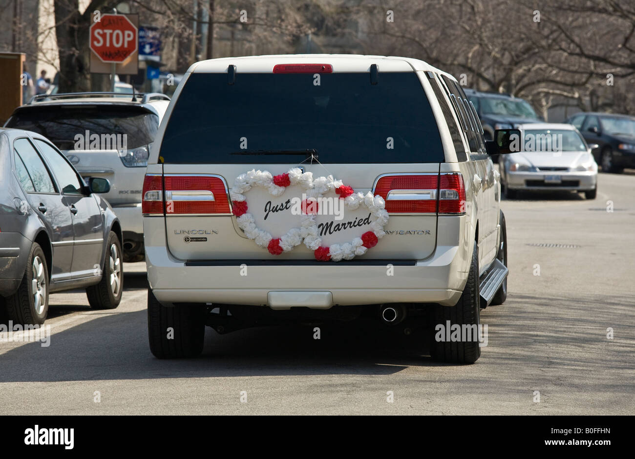 "Just Married" hearts sign SUV limo back view Stock Photo - Alamy