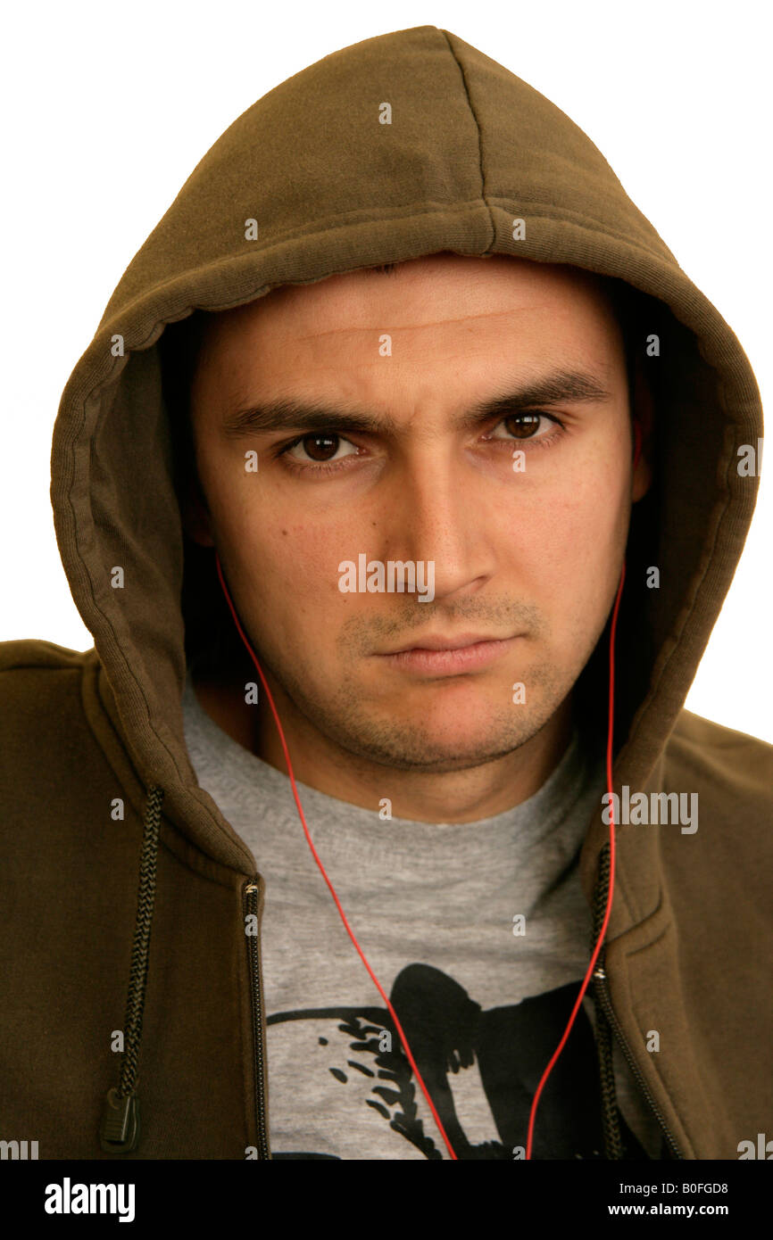 Hooded man with earphones Stock Photo - Alamy