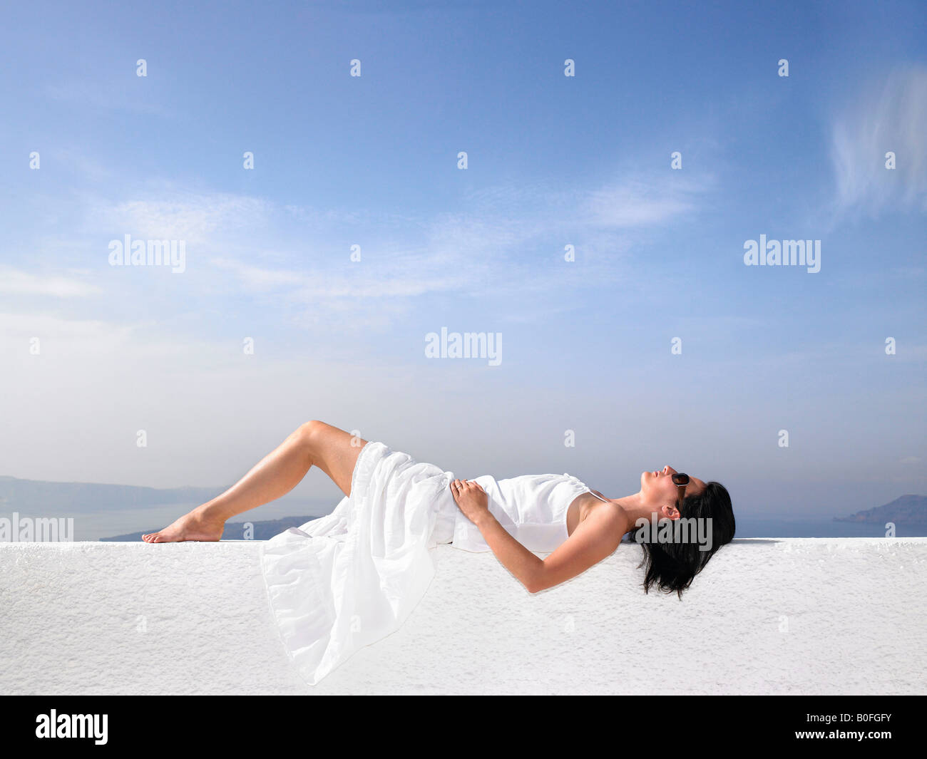 Side profile of woman with her hands on her hips hi-res stock ...